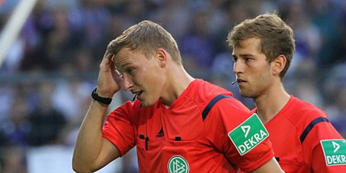 Spielabbruch: Schiedsrichter Petersen von Feuerzeug getroffen | DFB ...